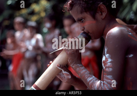 Australian aboriginal boy playing didgeridoo Stock Photo - Alamy