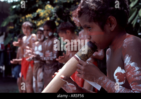 Australian aboriginal boy playing didgeridoo Stock Photo - Alamy