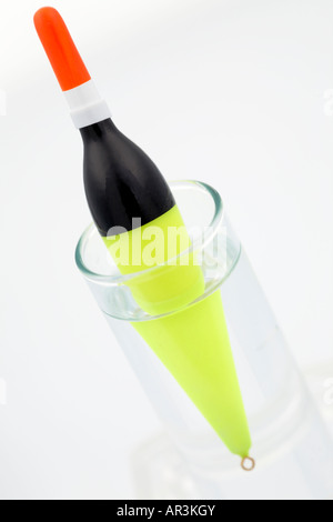 Fishing float in a test tube Stock Photo - Alamy