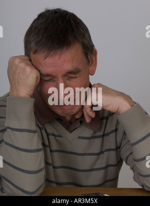 crying man depressed over debt problems Stock Photo - Alamy