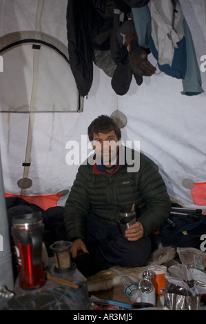 photographer Steven Kazlowski having morning coffee in the tent camp ...