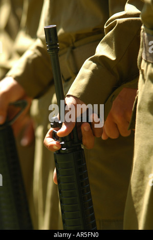 Row of IDF Soldiers holding M16 automatic rifles in Israel Stock Photo ...
