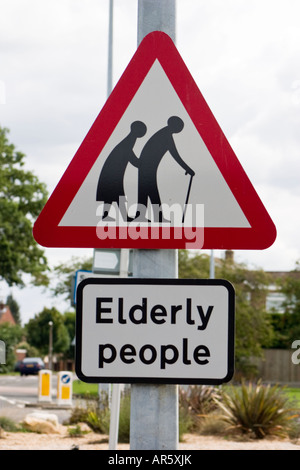 Old people warning red triangular road sign, This is a HomeWatch Area ...