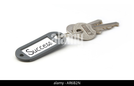 Key with a success tag Stock Photo - Alamy