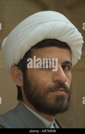 Iranian shiite muslim man with his face hidden by a veil mourning imam ...
