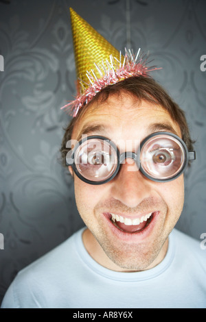 idiot in a party hat Stock Photo - Alamy