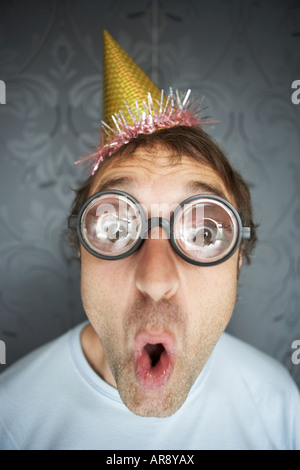 idiot in a party hat Stock Photo - Alamy