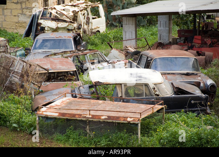 classic cars in scrap yard malta old maltese junk Stock Photo - Alamy