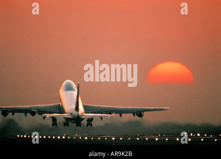 Boeing 747 taking off at sunset Stock Photo - Alamy
