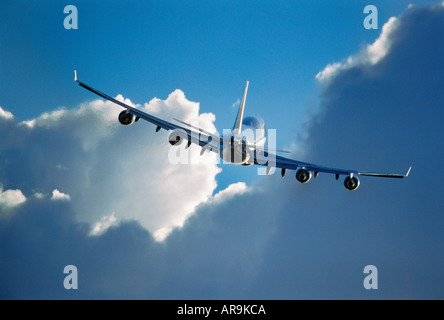 Boeing 747-8 Cargo aircraft cruising at high altitude with long white ...