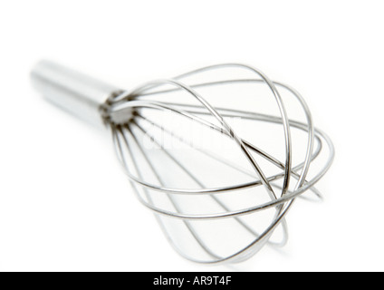 Chrome food whisk on white background Stock Photo - Alamy