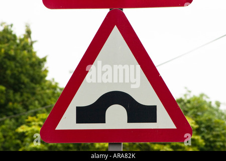Road traffic sign warning of humped zebra crossing Stock Photo - Alamy