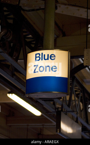 Blue zone sign at Lancaster train station Stock Photo - Alamy