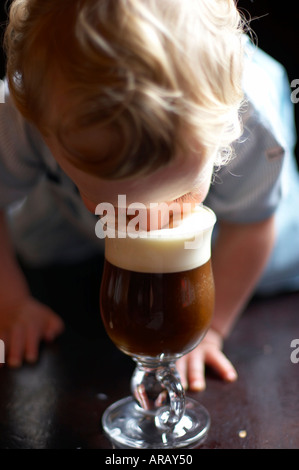 baby tasting Irish coffee Stock Photo - Alamy