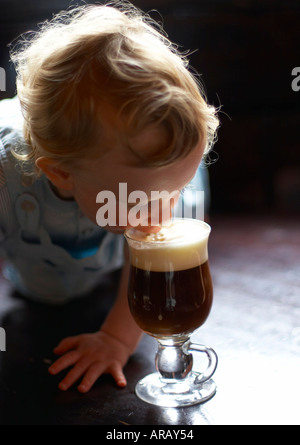baby tasting Irish coffee Stock Photo - Alamy