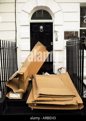 Home front door with a pile of junk mail Stock Photo - Alamy