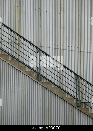Metal walled building with staircase Stock Photo - Alamy