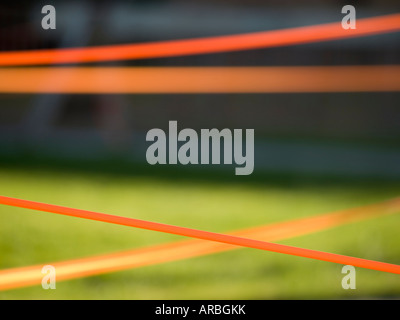 Tape indicating off limits lawn Stock Photo - Alamy