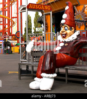 Statue of clown in amusement park, vibrant and cheerful attraction for ...