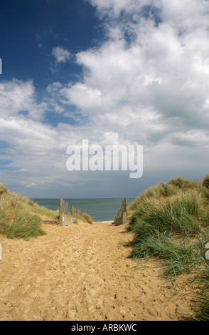 Beach at Waxham, Norfolk, UK, with blue sky and cumulus clouds Stock ...