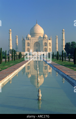 Distant daytime view of the Taj Mahal taken through an open window in ...