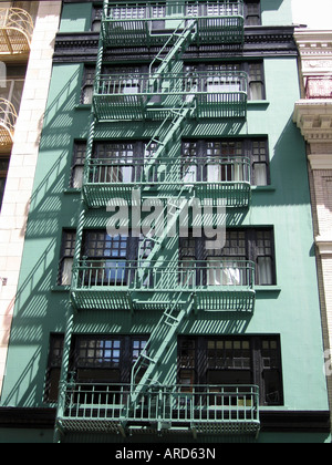Shadows cast by fire escapes from apartment buildings, San Francisco ...