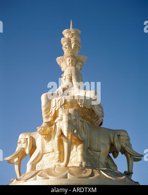 Multi faceted Buddha statue at top of Emei Shan Stock Photo - Alamy