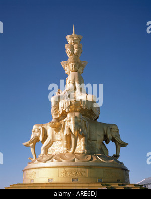Multi faceted Buddha statue at top of Emei Shan Stock Photo - Alamy