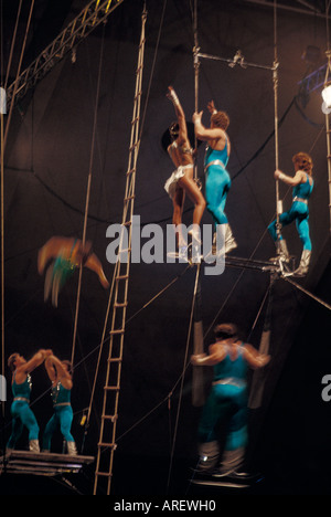circus performer trapeze artist spotlight Stock Photo - Alamy