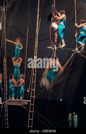 circus performer trapeze artist spotlight Stock Photo - Alamy