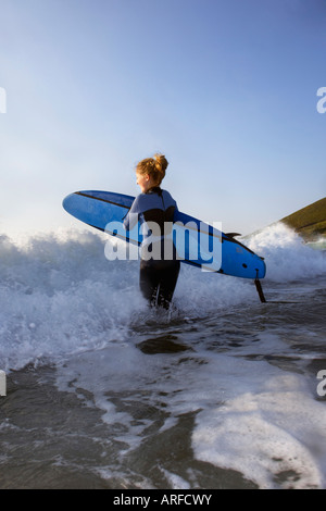 surfer running with his board Stock Photo - Alamy