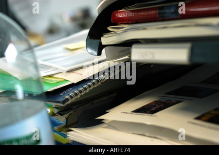 Messy office desk and table with piles of files and disorganized ...