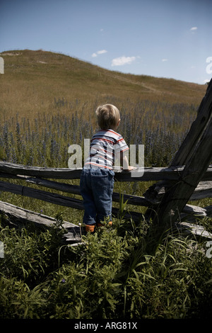 Boy looking at someone. Outdoor Stock Photo - Alamy