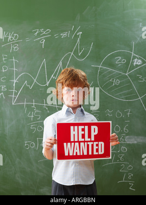 Boy holding help sign Stock Photo - Alamy