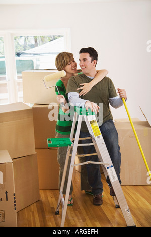 Young latin painter couple smiling happy painting at art studio Stock ...