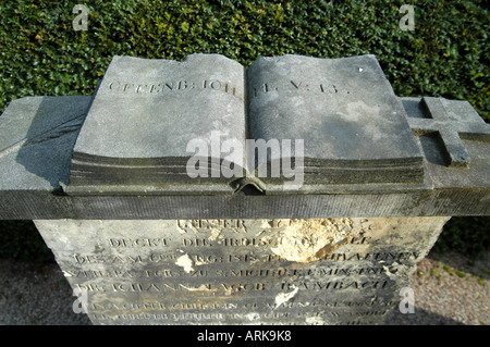 Ancient gravestone with open bible, cemetery in Ohlsdorf, Hamburg ...
