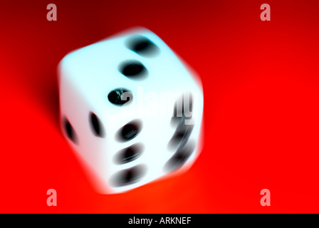 white spinning die concept image Stock Photo - Alamy