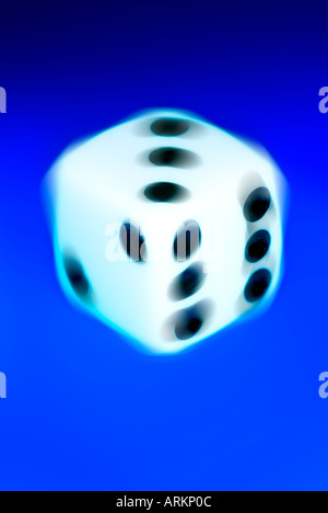 white spinning die concept image Stock Photo - Alamy