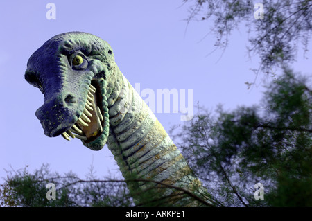 plastic dinosaur, monster, kitsch, blue, sky, horizontal, head, teeth ...