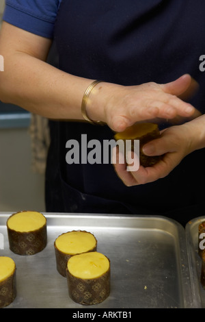 Lady baker making Christmas cakes Stock Photo - Alamy