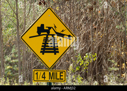 Traffic sign warning motorist of a railroad train track on a connecting ...