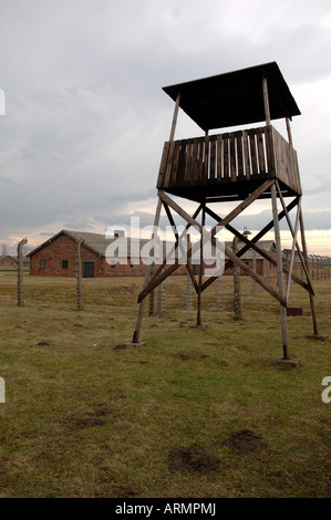 A guard tower overlooking the concentration camp Auschwitz II-Birkenau ...
