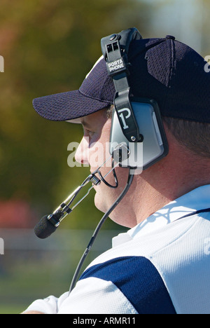 High school football coach communicate with other coaches by way of ...
