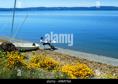 Using cellphone at outdoor Stock Photo - Alamy
