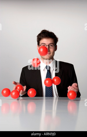 Portrait mature business man juggling multitasking Stock Photo - Alamy