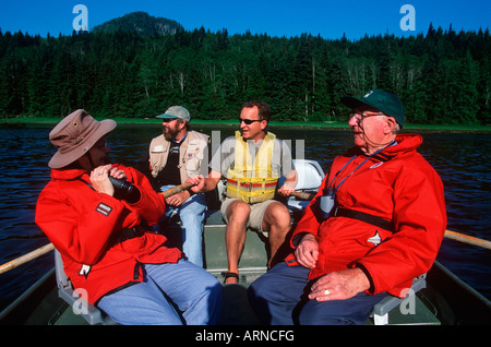 CANADA, BRITISH COLUMBIA, KNIGHT INLET, TOURISTS IN OBSERVATION STAND ...