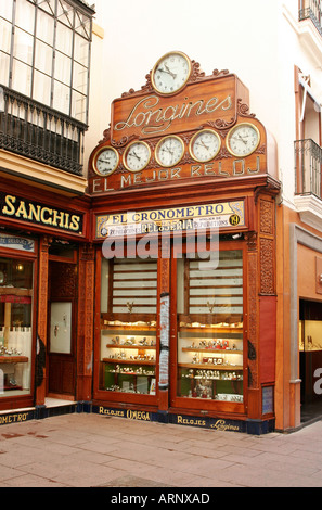 Spain, Andalusia, Seville, clocks, Longines shop sign Stock Photo - Alamy