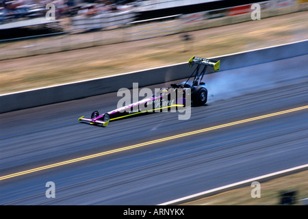 Kristen Powell competes in her drag racer at the 1997 Mopar Nationals ...