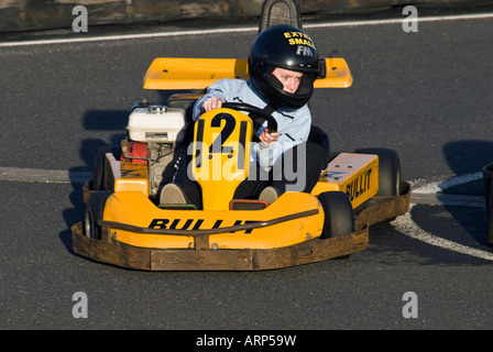 Boy racer driving racing [go cart] Stock Photo - Alamy