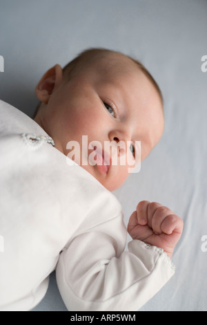 A hand clenched into a fist with the arm bent at the elbow highlights ...